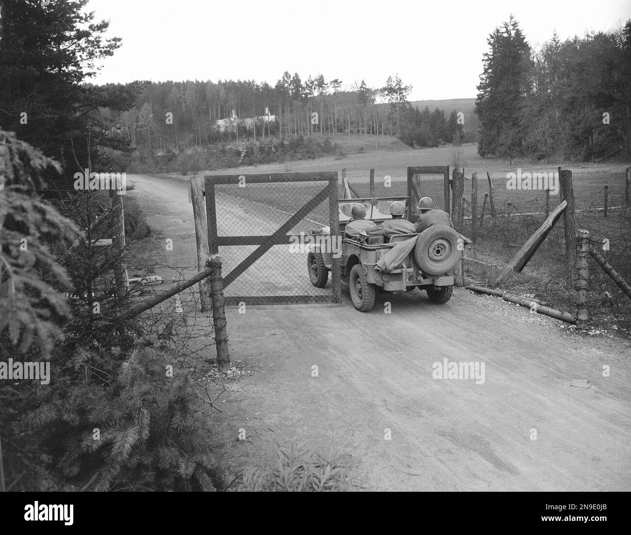 Entrance to the “Eagle's Nest”-- barbed wire and heavy gates make added ...