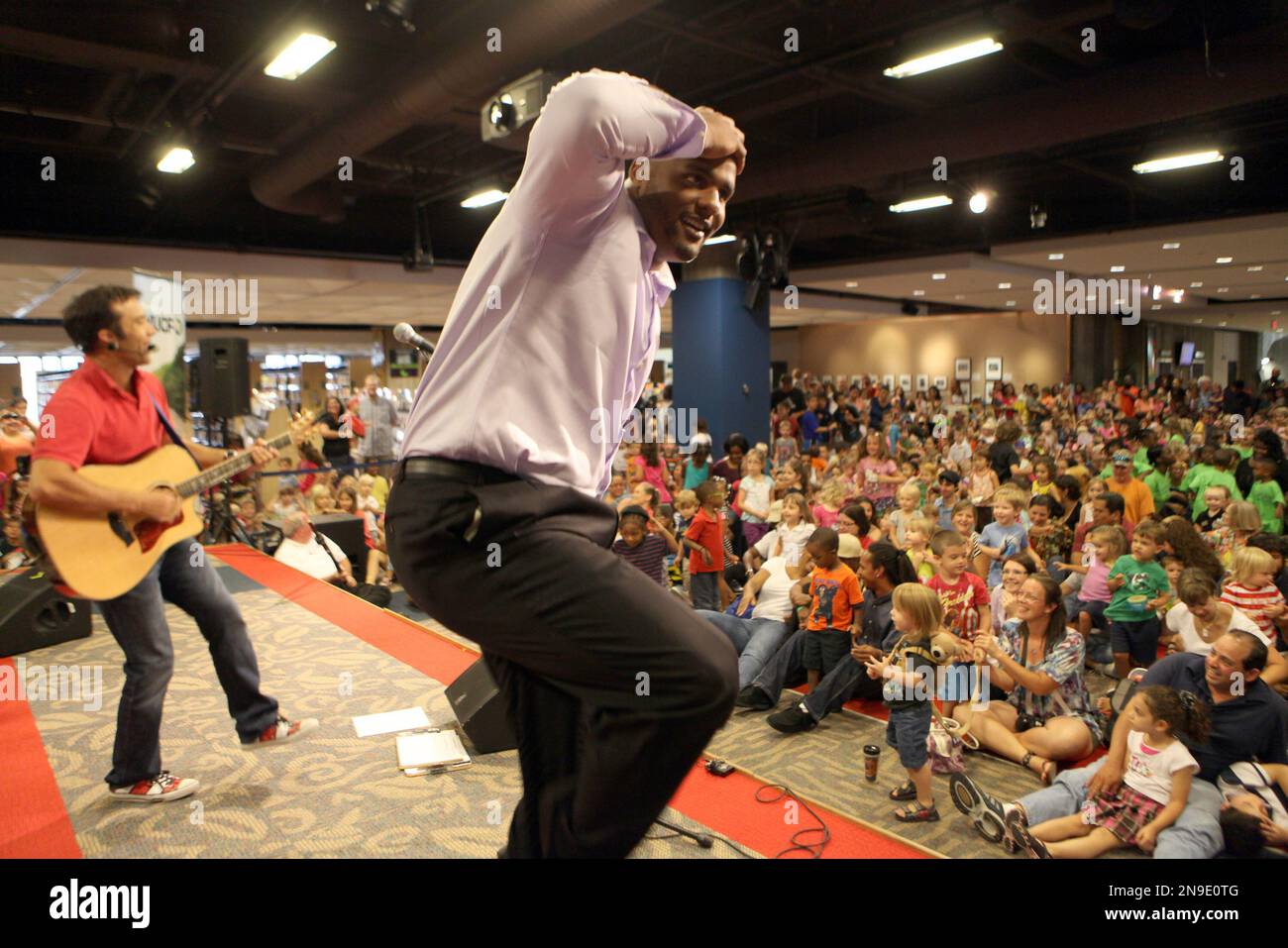 NBA player Glen "Big Baby" Davis dances on stage during the Soar with ...
