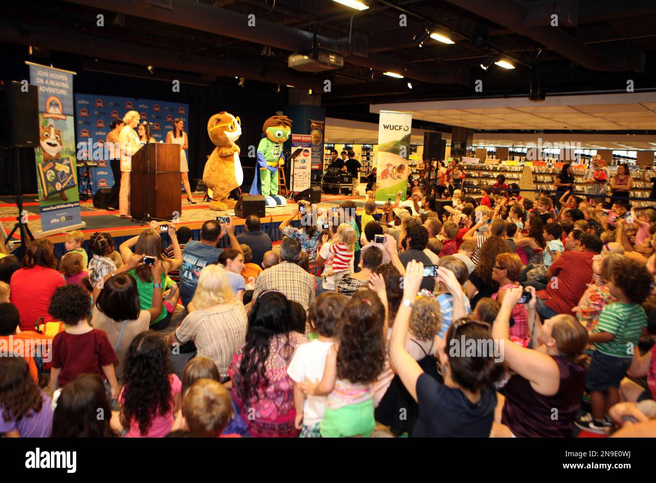 PBS mascots Hooper and Super Why, on stage during the Soar with Reading event, a JetBlue and PBS ...