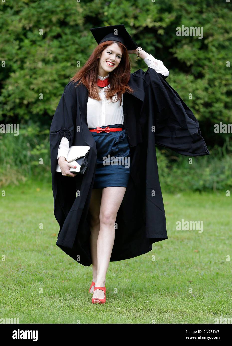 Lucy Nicholls poses for a photograph ahead of her graduation ceremony ...