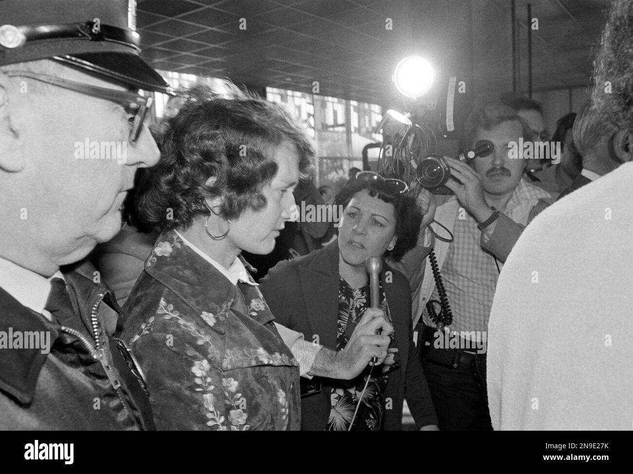 Wanda Johnson, right, who told news people she has had no word on the ...