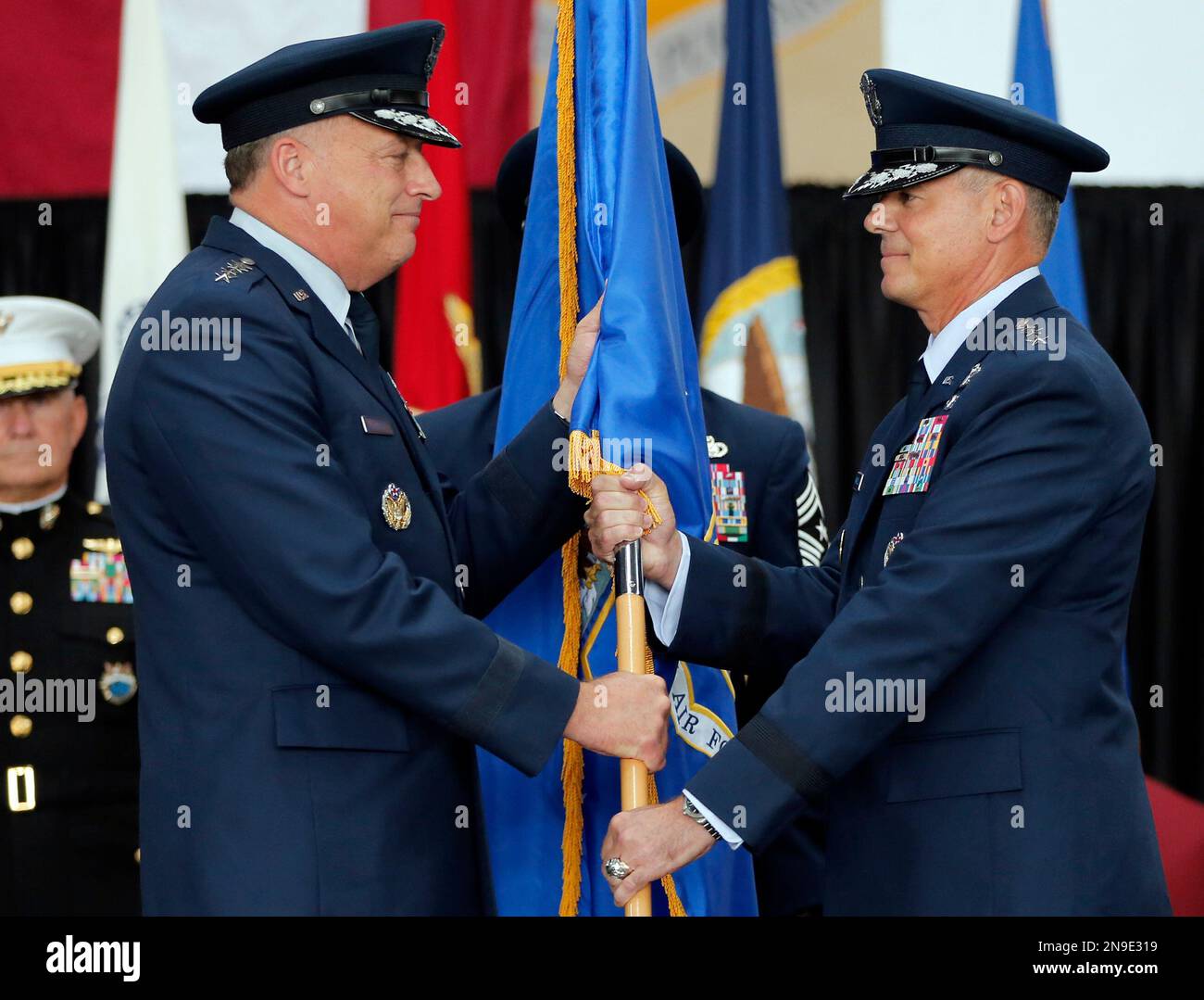 Pacific Air Forces Commander, Gen. Gary L. North, left, hands over the ...
