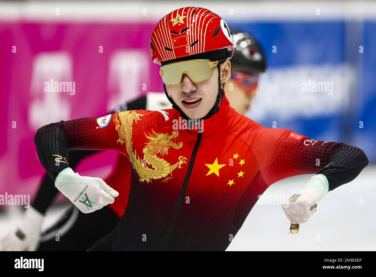 DORDRECHT - Xiaojun Lin (CHN) cheers after winning the final 500 meters ...