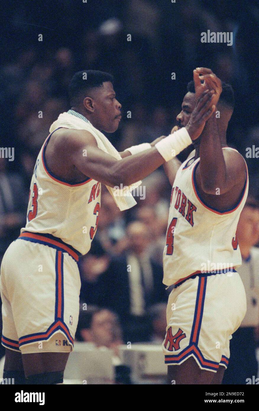 New York Knicks Patrick Ewing, left, and Charles Oakley congratulate ...