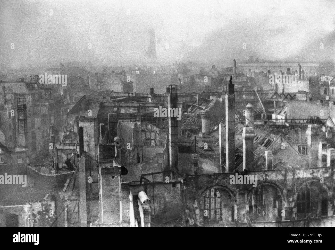 Smoke and bombed out buildings remain in this central area of Berlin on ...