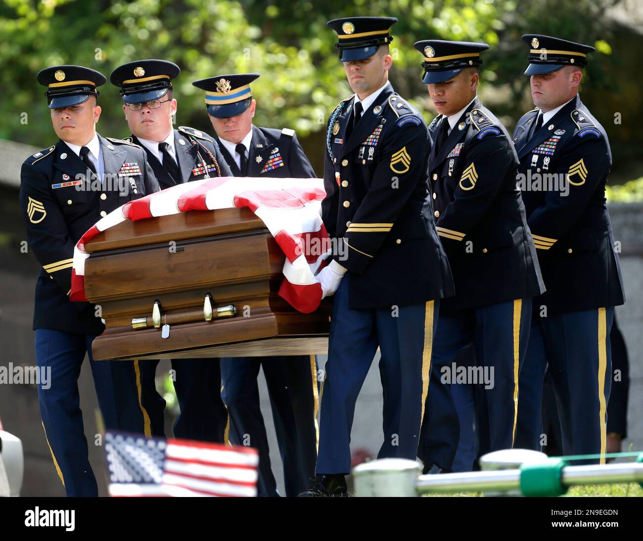 Pallbearers carry the casket containing the body of Army Spc. Jonathan ...
