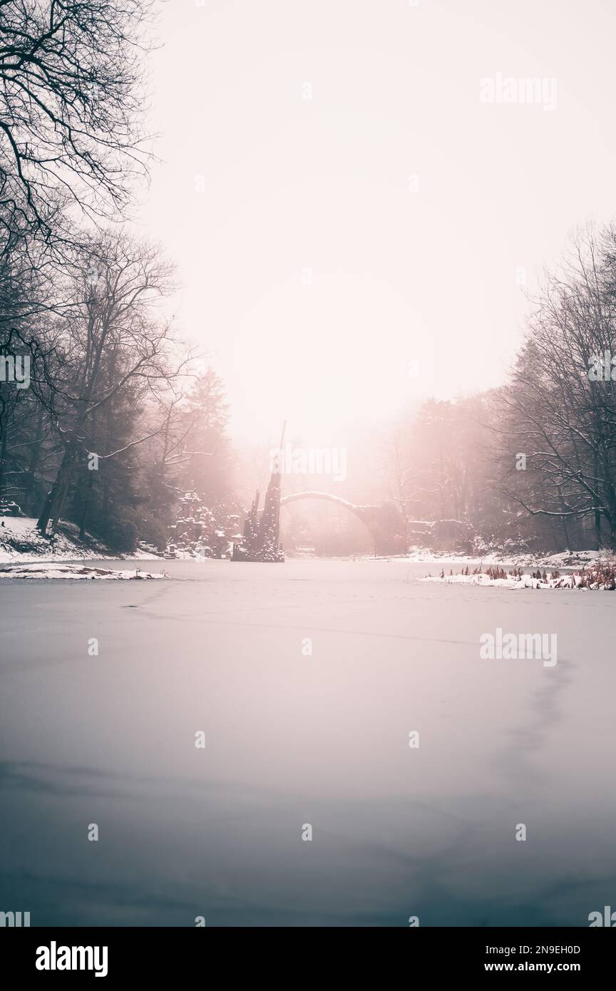 Middle Earth in Winter: An Old Stone Bridge over a Frozen Lake Stock ...