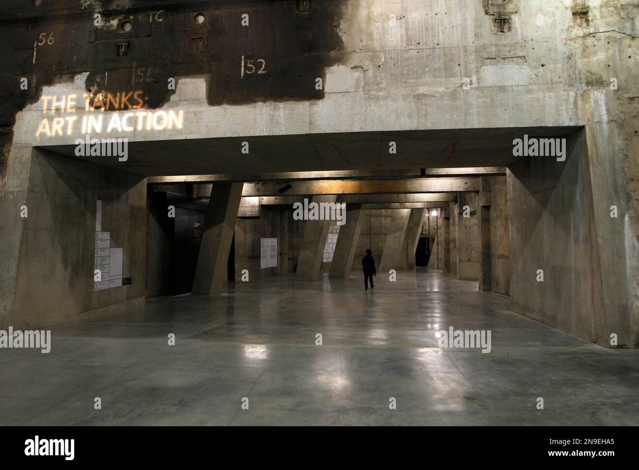 A visitor walks through The Tanks at Tate Modern in London, Monday ...