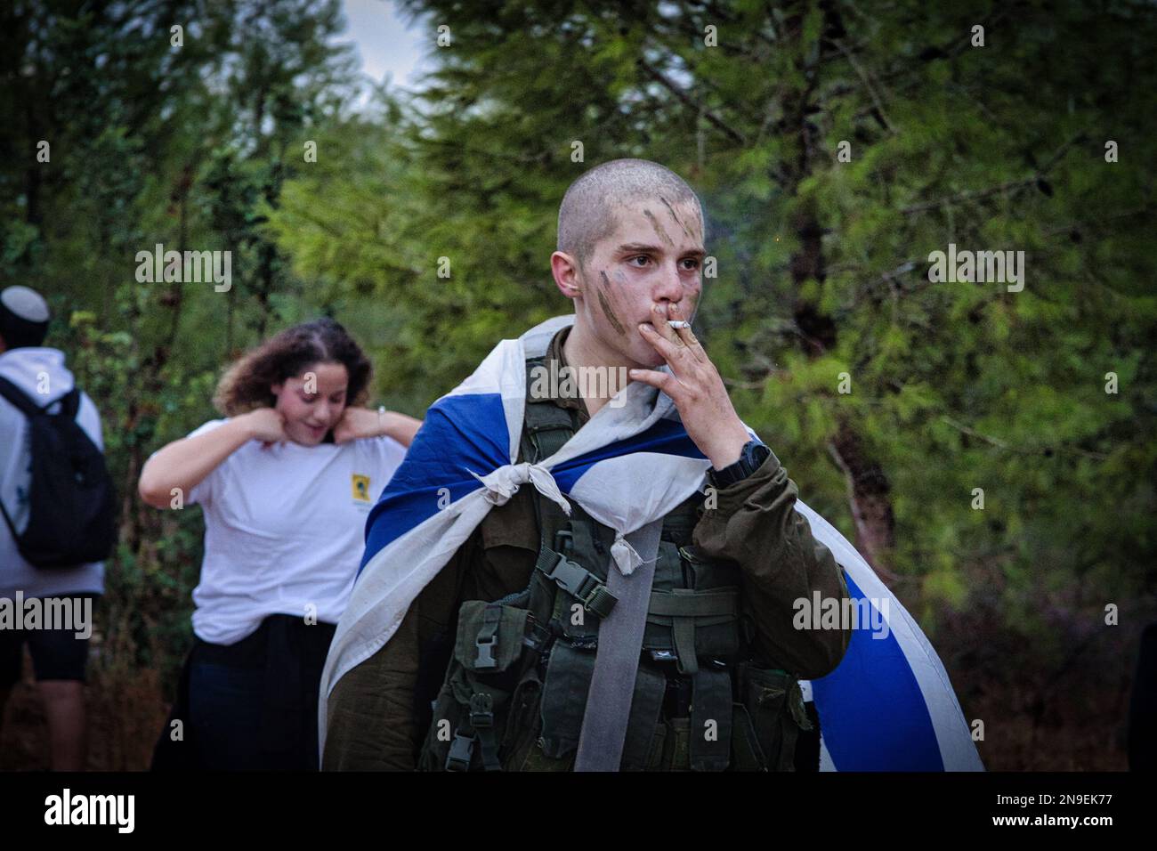 A Golani soldier smoking a cigarette during a parade in the city of ...