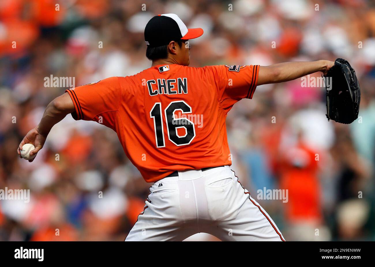Baltimore Orioles starting pitcher Wei-Yin Chen, of Taiwan, throws to ...
