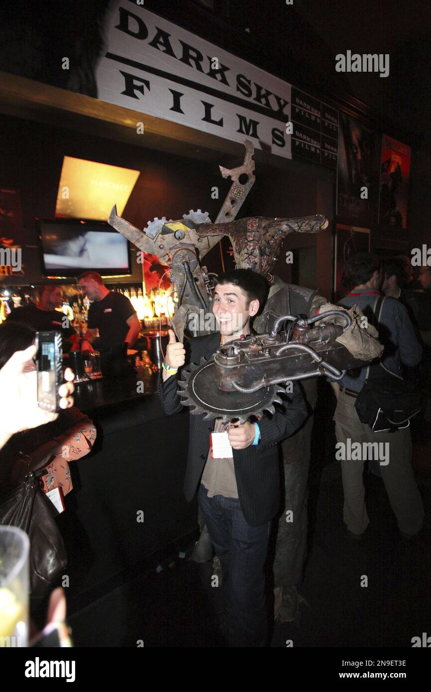 A Zombot character from Frankenstein's Army interacts with guests at ...