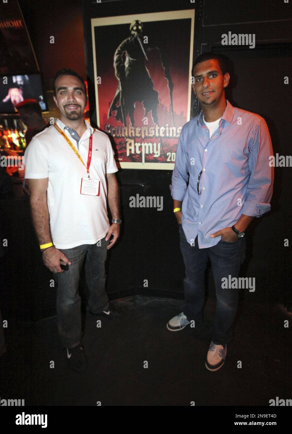 From right, Producer Hamza Ali celebrates with a guest at the Fear Net ...