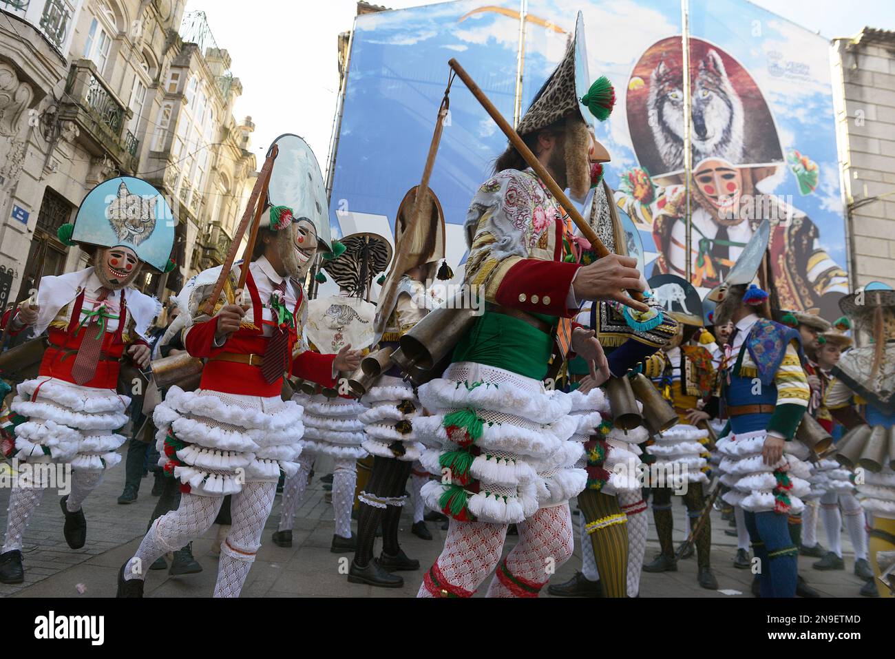 'Cigarrones' interact with the public during the celebration of ...