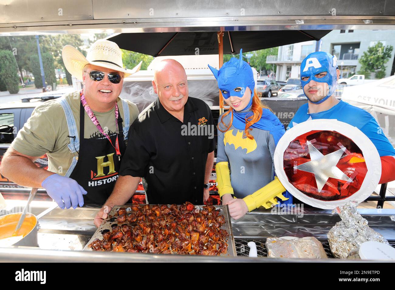 From left, Trace "The Rib Whisperer" Arnold, Phil Pace, Batgirl, and ...