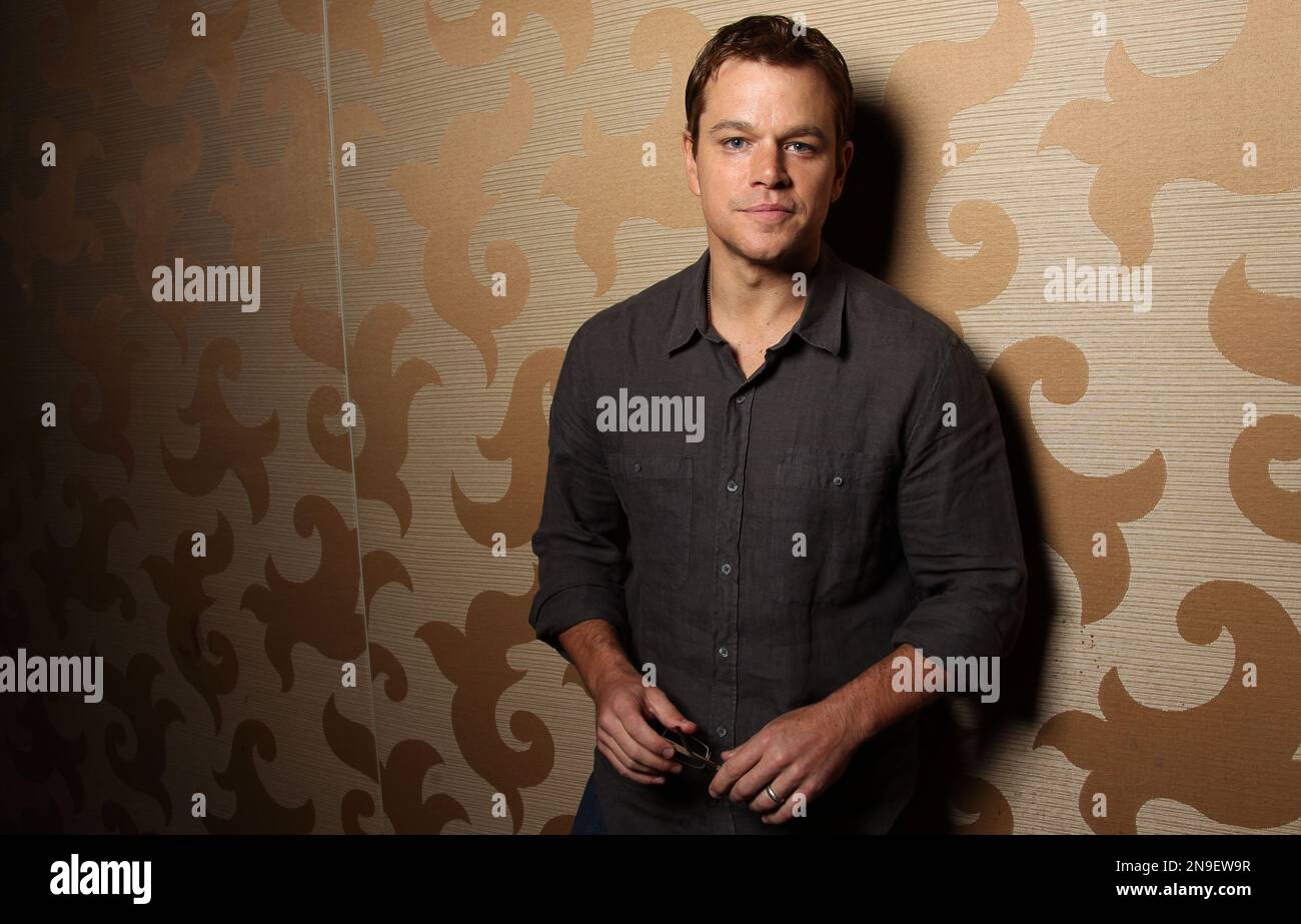 Actor Matt Damon, from the upcoming film "Elysium", poses for a ...