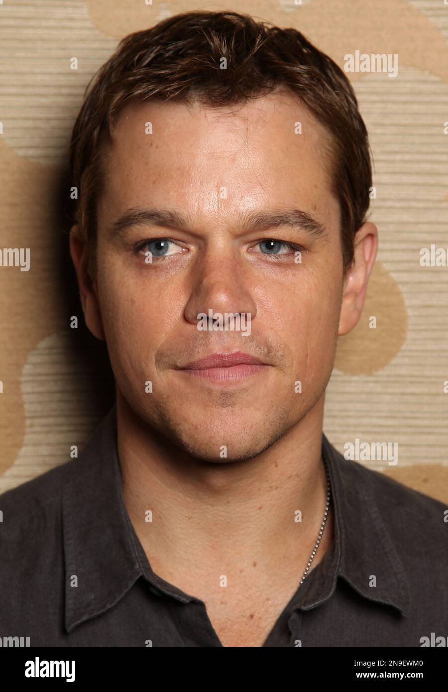 Actor Matt Damon, from the upcoming film "Elysium", poses for a ...