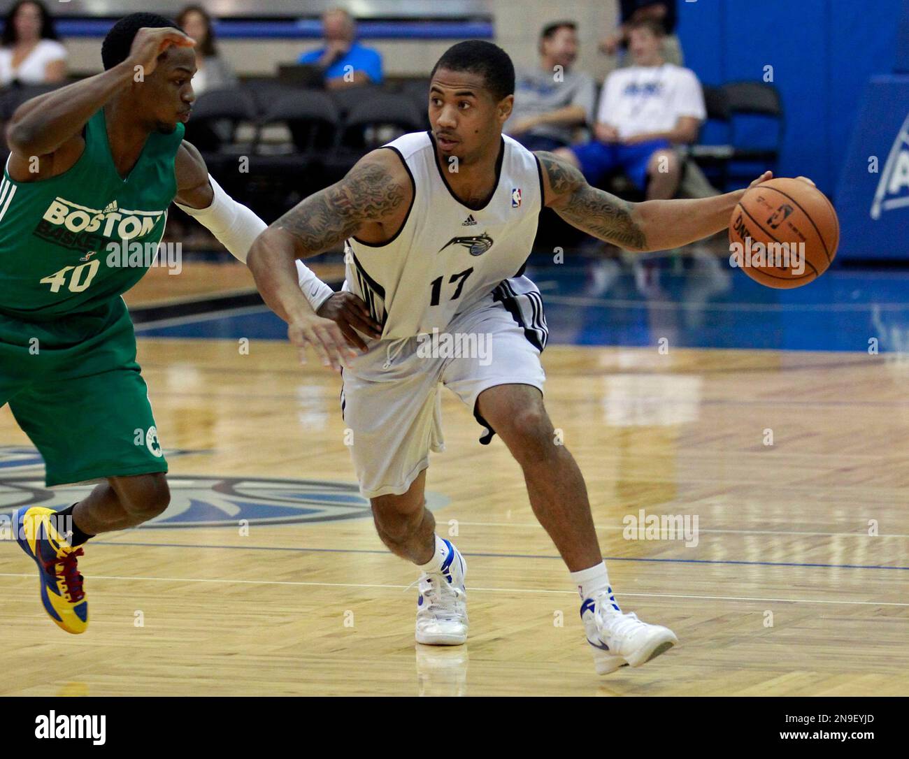 Orlando Magic's Charlie Westbrook (17) drives around Boston Celtics ...