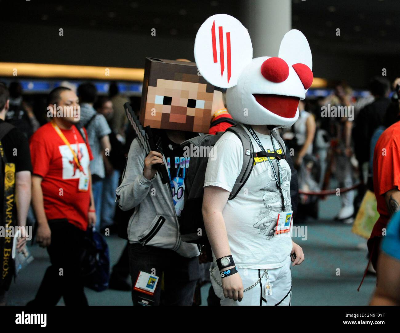 Costumed characters on the first day of the Comic-Con convention held ...