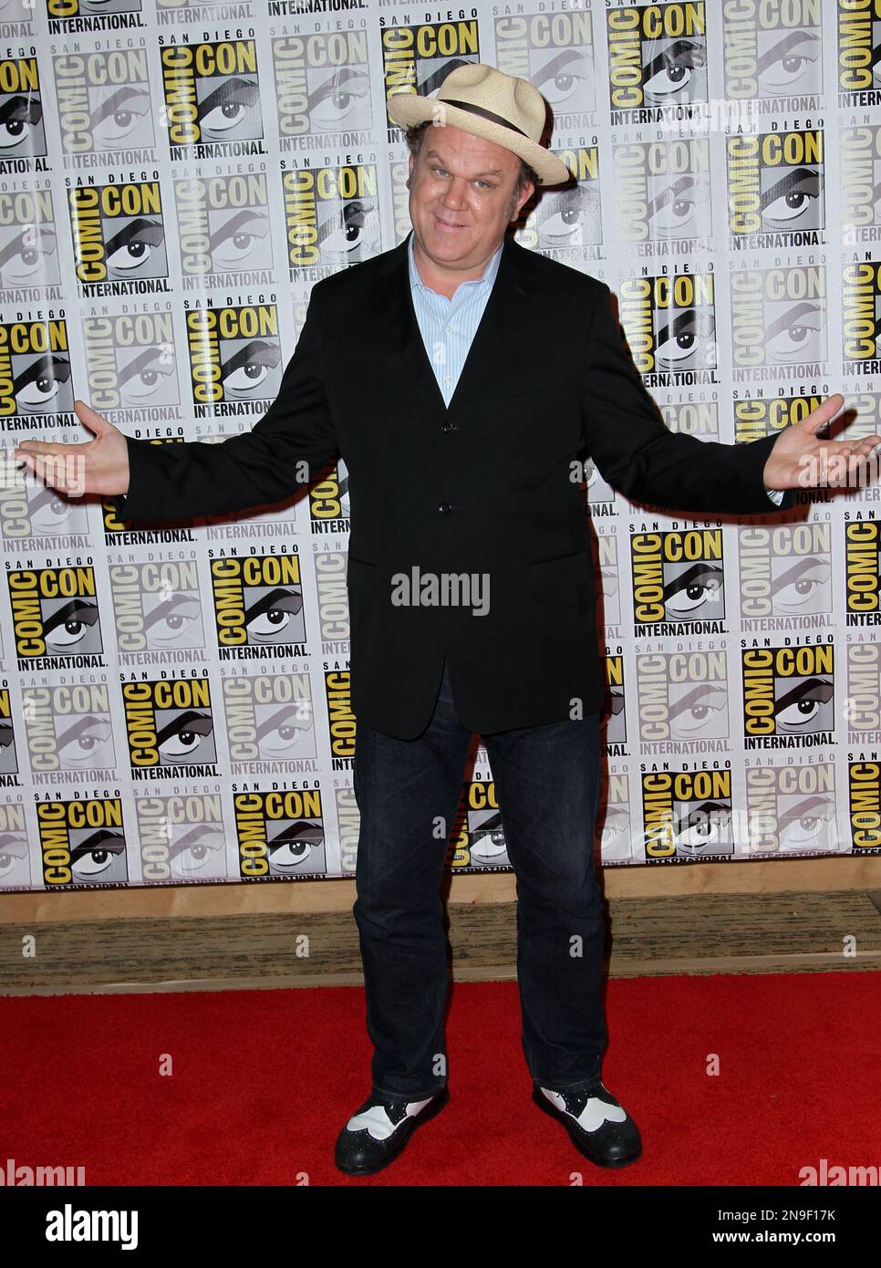 Actor John C. Reilly, from the film "Wreck-It Ralph", arrives at the ...