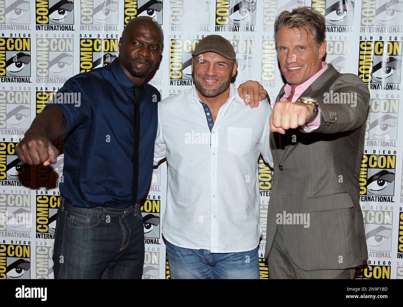 Actors Dolph Lundgren, right, Randy Couture, center, and Terry Crews ...