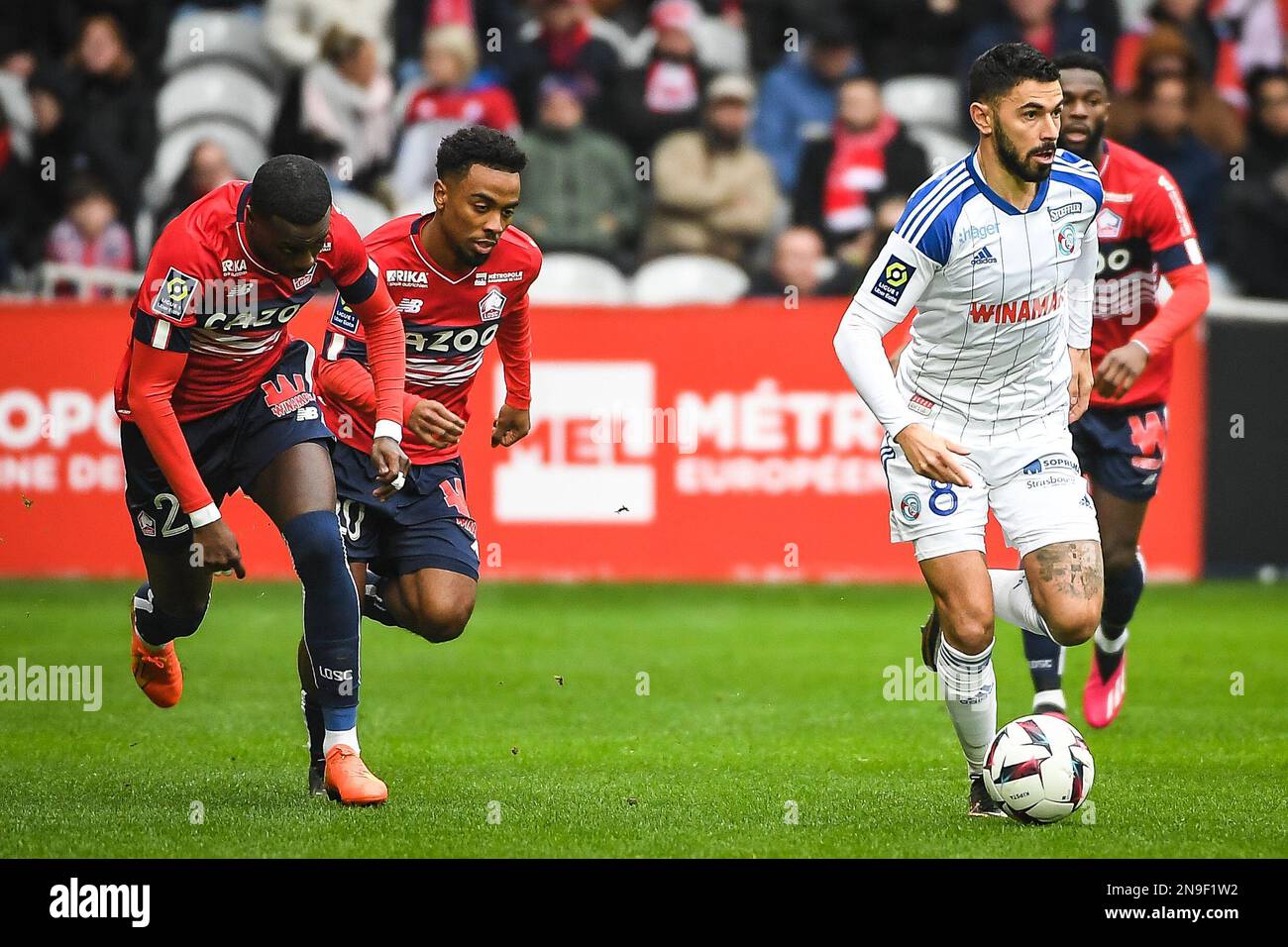 Timothy WEAH of Lille, Angel GOMES of Lille and Morgan SANSON of ...