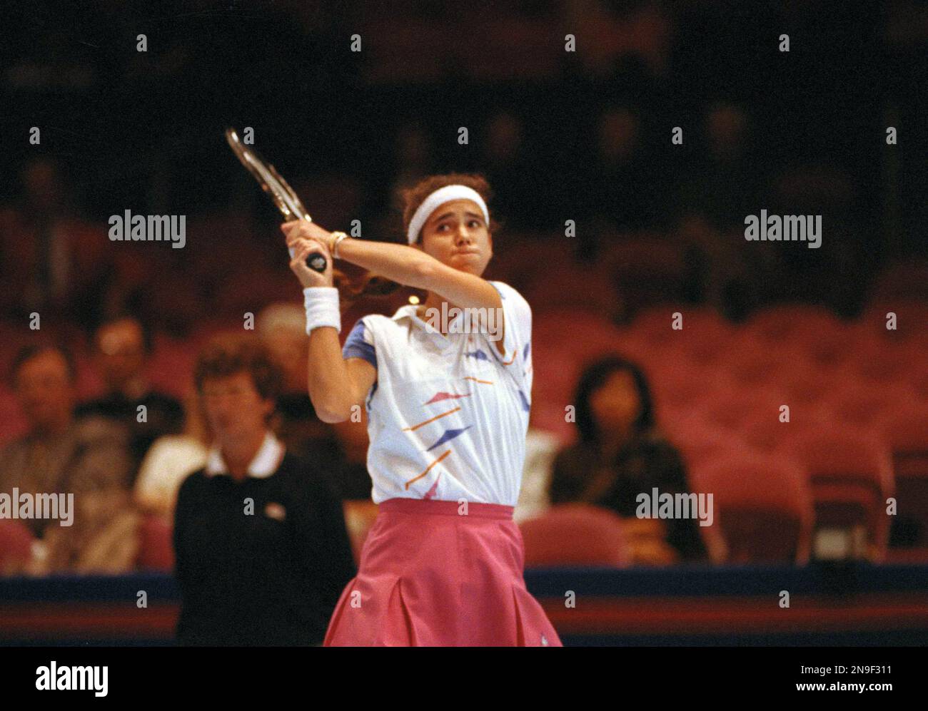 Fourth-seeded Mary Joe Fernandez returns a shot to Nathalie Tauziat of ...
