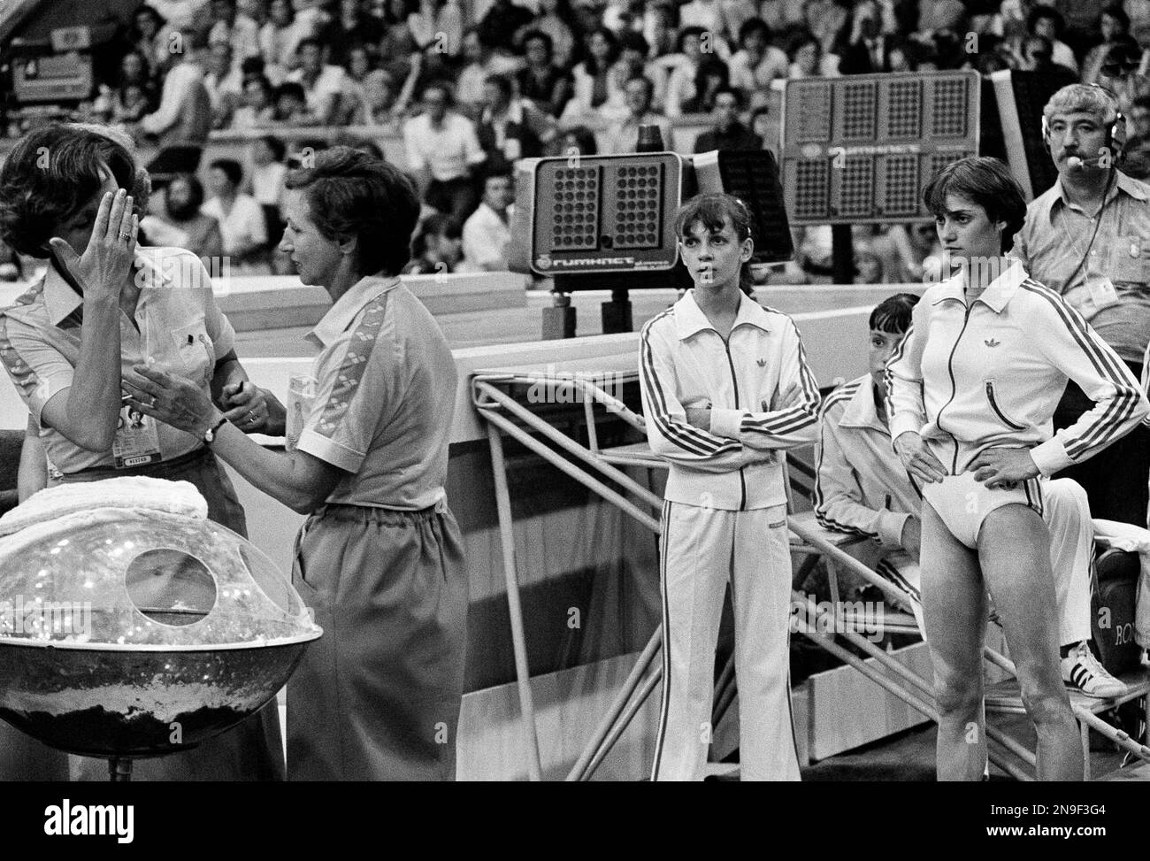 Nadia Comaneci, right, watches raging controversy in Moscow on Thursday ...