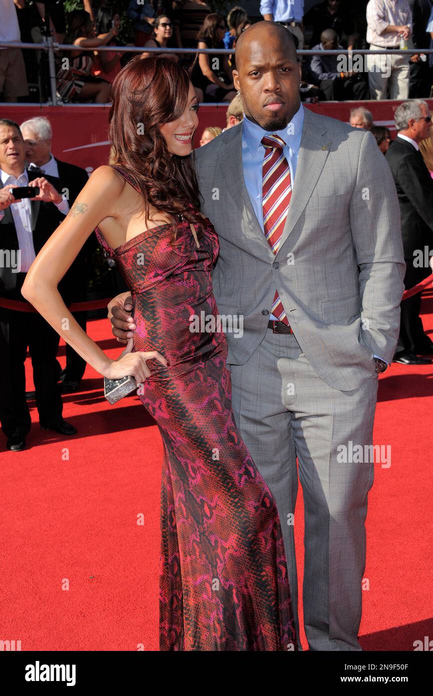 Baltimore Ravens linebacker Terrell Suggs, right, and Candace Williams ...