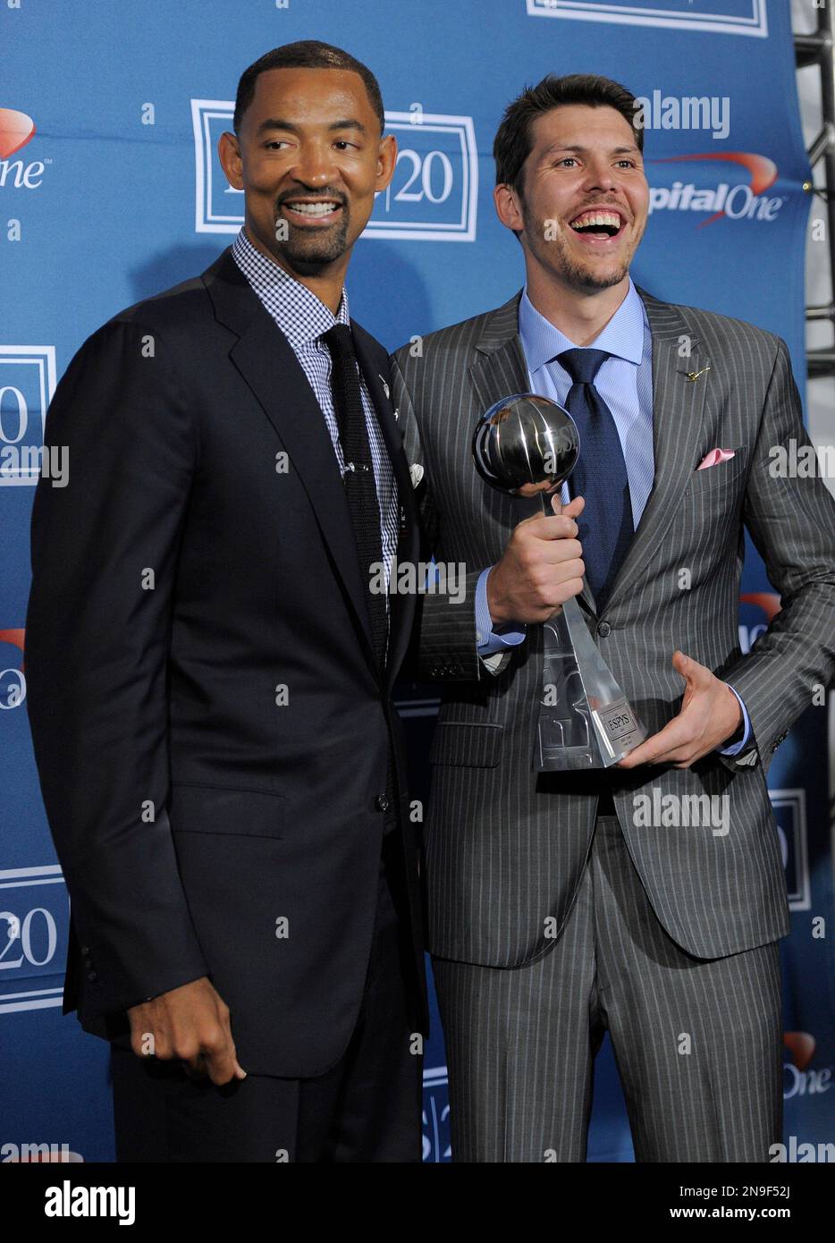 Miami Heat's Juwan Howard, left, and MIke Miller pose backstage with ...