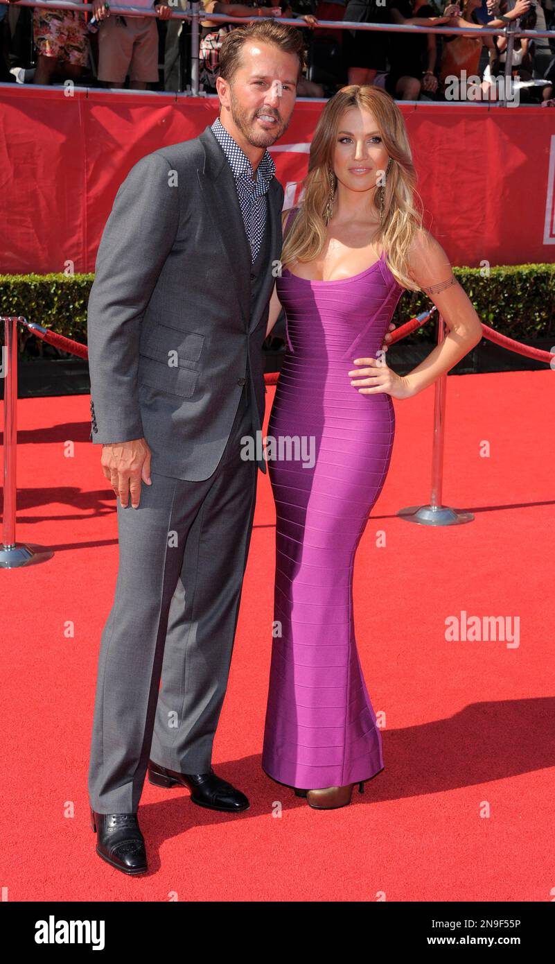 Mike Modano, left, and Willa Ford arrive at the ESPY Awards on ...