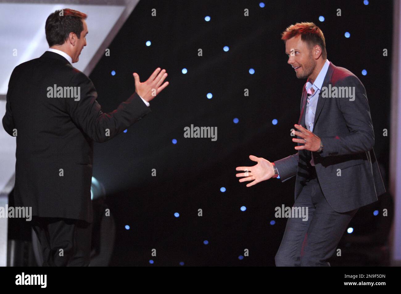 Joel McHale, left, and Rob Riggle are seen onstage at the ESPY Awards ...