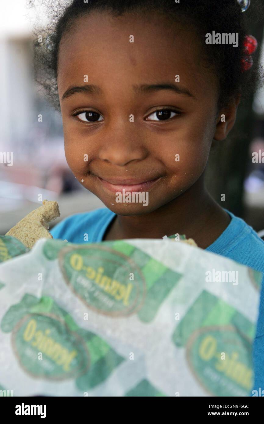 COMMERCIAL IMAGE-Mary-Lorraine Booth enjoys a turkey sandwich after ...