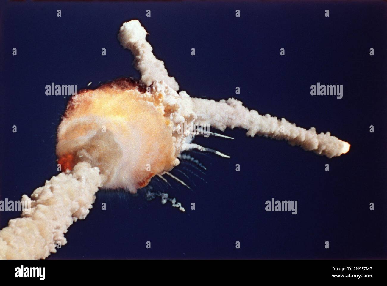 FILE - In this Jan. 28, 1986 file photo, the space shuttle Challenger explodes shortly after ...