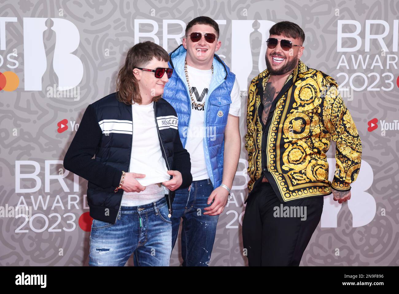 Bad Boy Chiller Crew pose for photographers upon arrival at the Brit ...