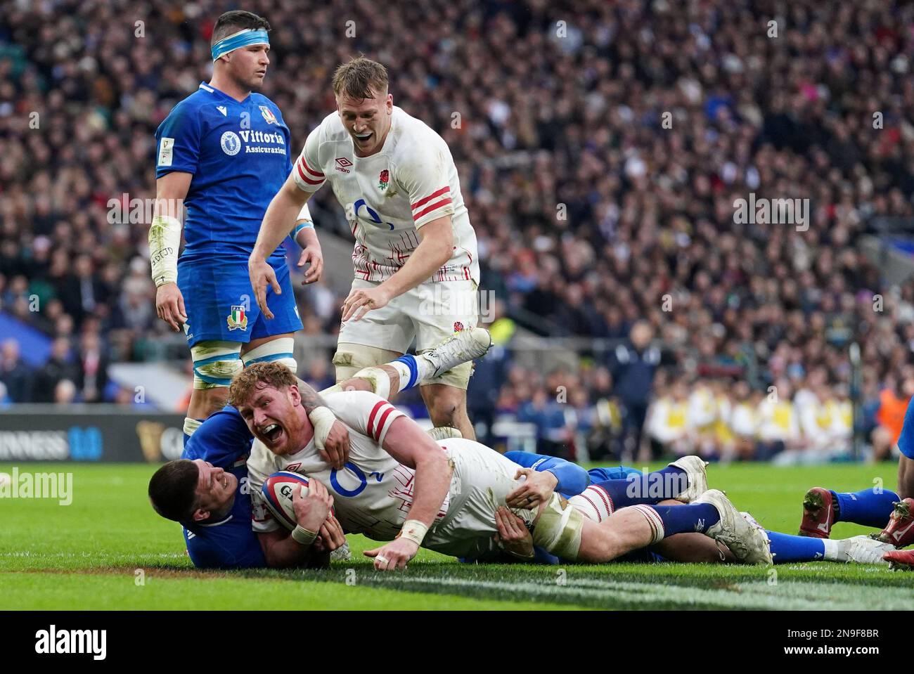 England's Ollie Chessum dives in to score his sides second try during ...