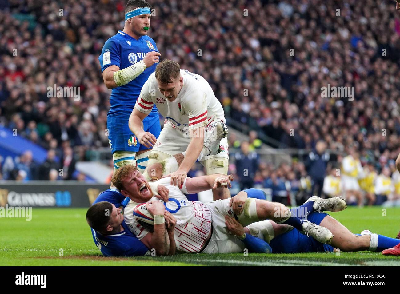 England's Ollie Chessum dives in to score his sides second try during ...