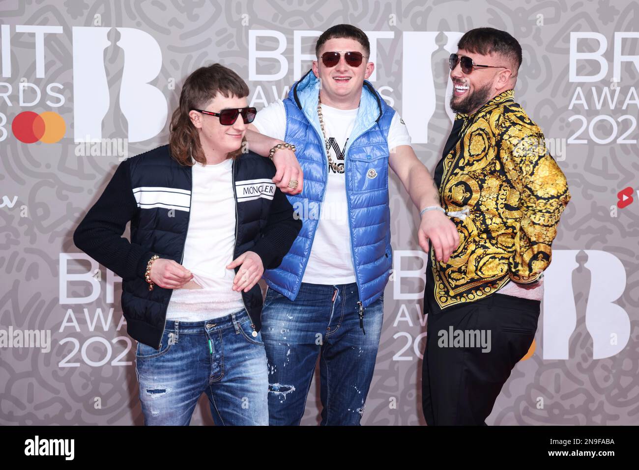 Bad Boy Chiller Crew pose for photographers upon arrival at the Brit ...