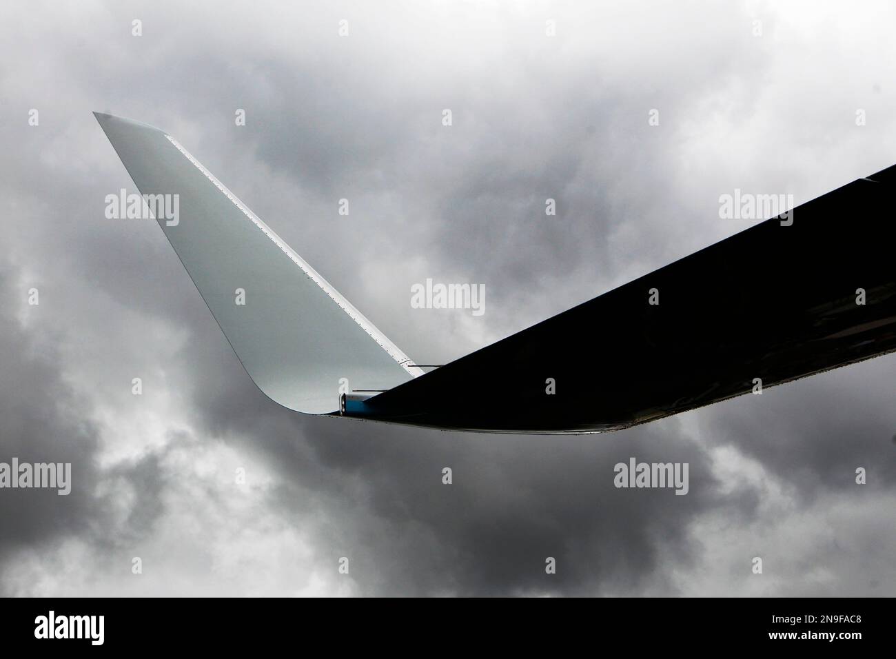 The wing tip of a Boeing 737-900ER is seen on display at the ...