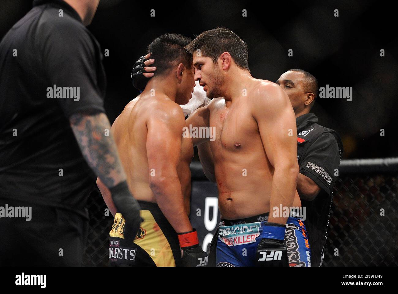 Cung Le, left, and Patrick Cote congratulate each other after their UFC ...