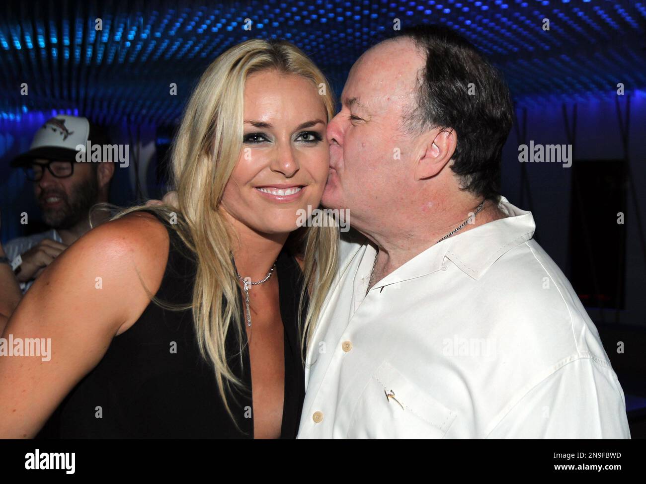 COMMERCIAL IMAGE - Actor Dennis Haskins, right, kisses Lindsey Vonn at ...