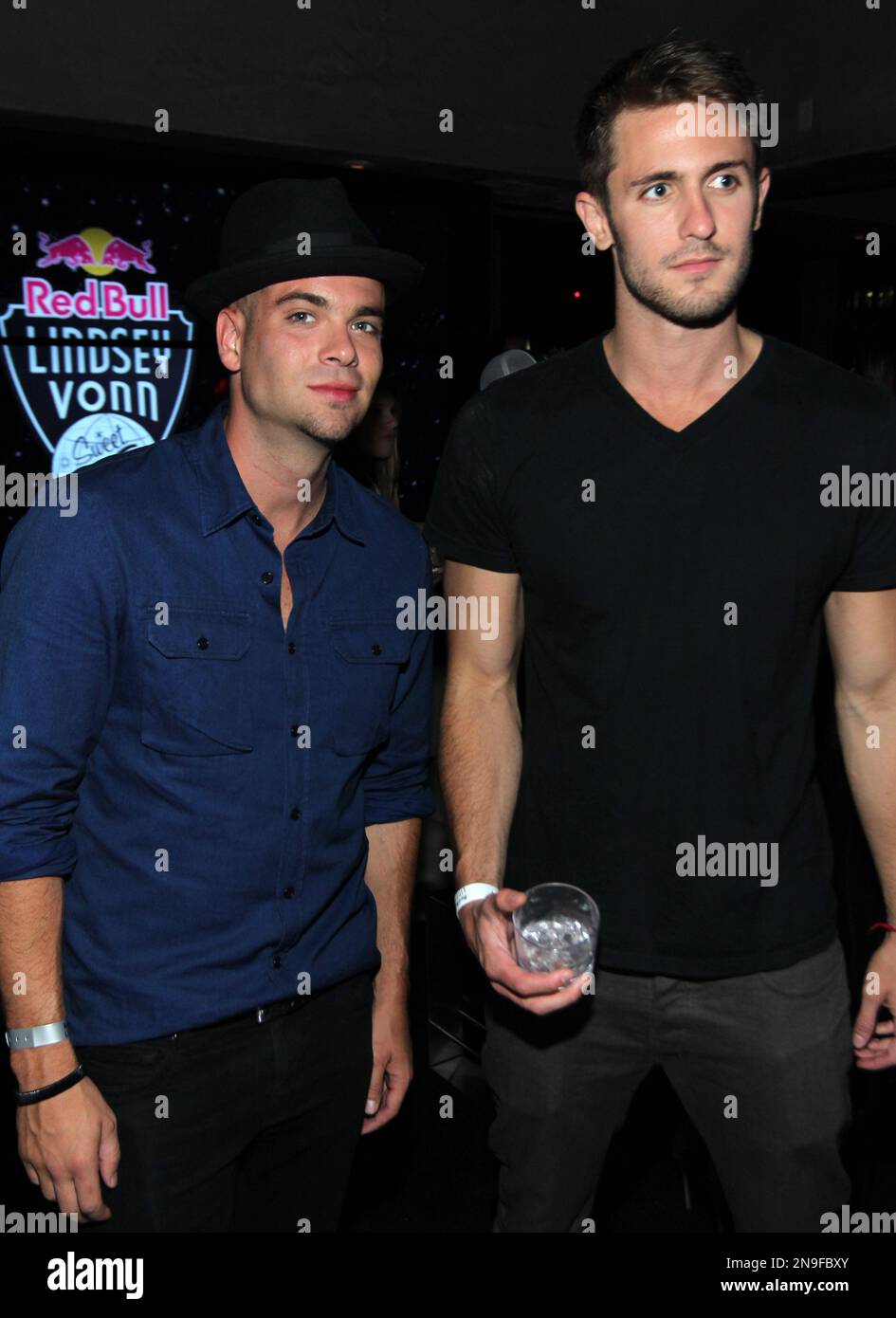 Actor Mark Salling, left, and Phil Haus pose together at the Red Bull ...