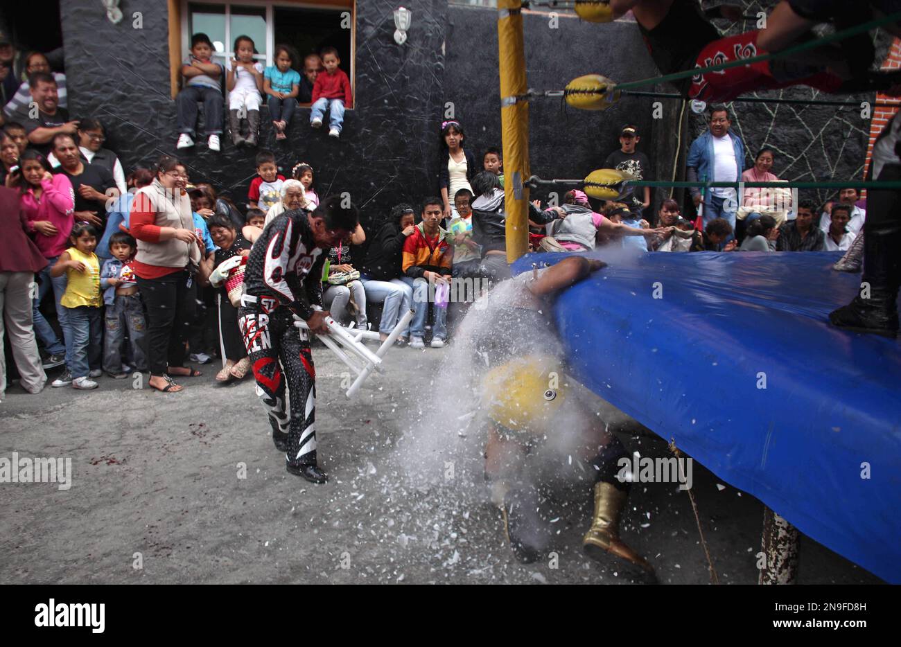 In this photo taken on Sunday, May 13, 2012, Mexican Lucha Libre ...