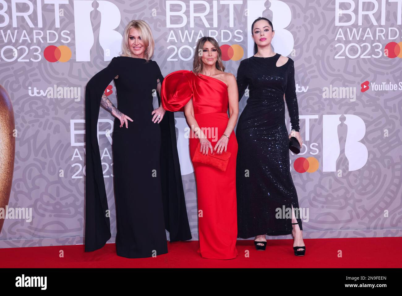Tina Barrett, Rachel Stevens and Jo O'Meara pose for photographers upon ...