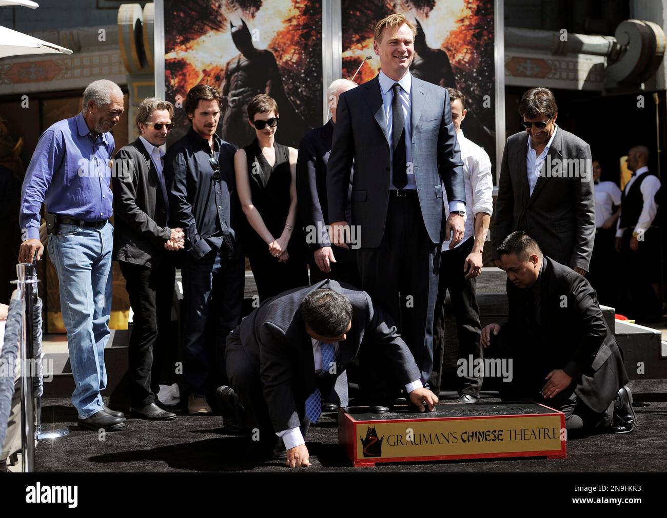 Christopher Nolan, center, director of the upcoming film "The Dark ...