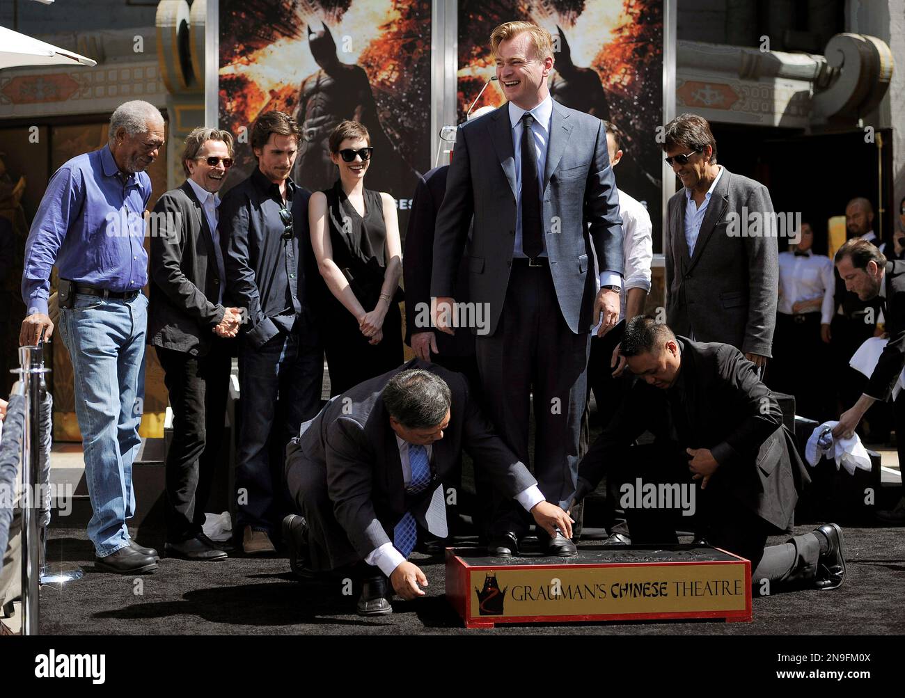 Christopher Nolan, center, director of the upcoming film "The Dark ...
