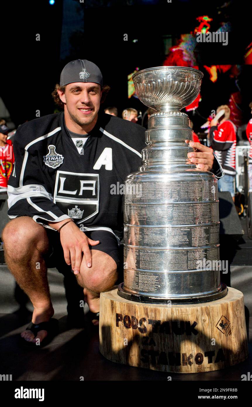 Slovenian ice hockey player Anze Kopitar poses next to the Stanley Cup ...