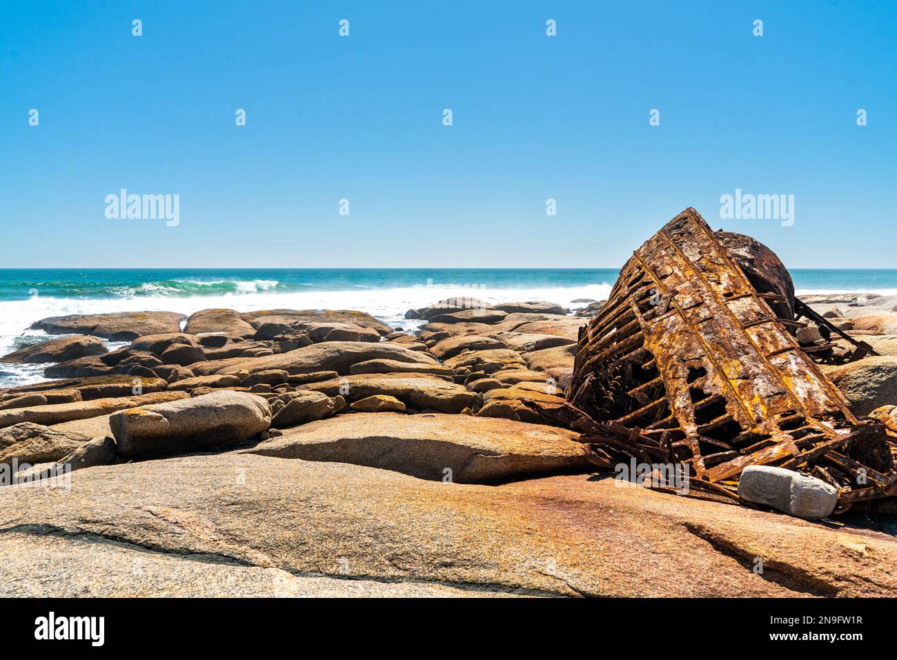 The wreck of the Aristea lies on the rocks on the Atlantic Ocean coast ...