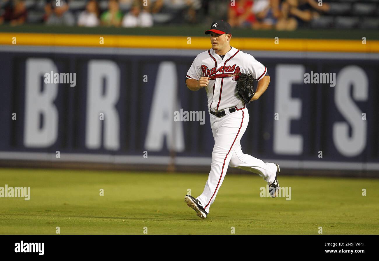 Atlanta Braves relief pitcher Craig Kimbrelruns onto the a baseball ...