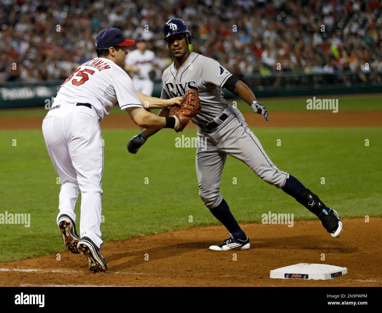 Cleveland Indians first baseman Casey Kotchmann (35) tags out Tampa Bay ...