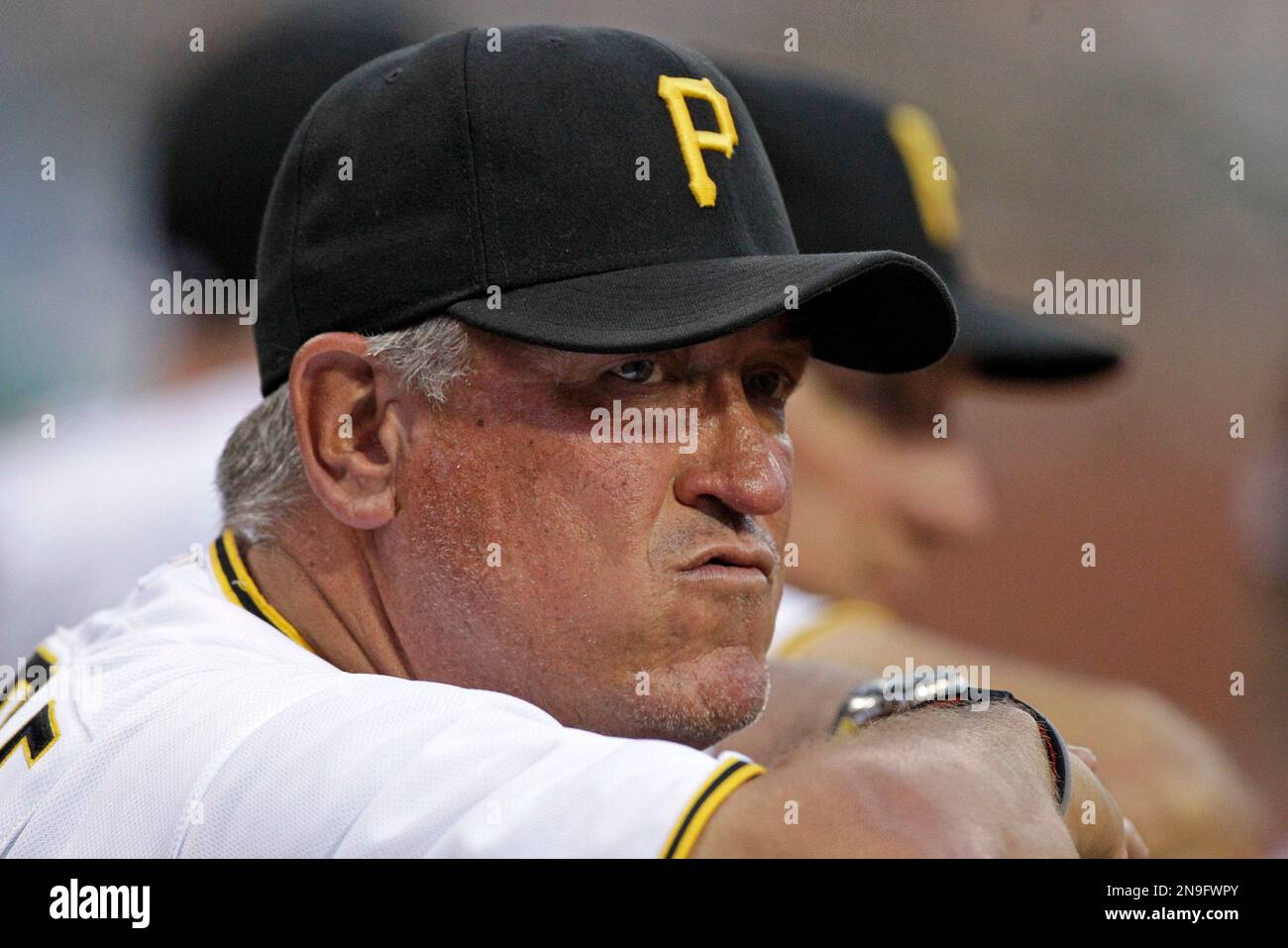 Pittsburgh Pirates manager Clint Hurdle stands in the dugout during the ...